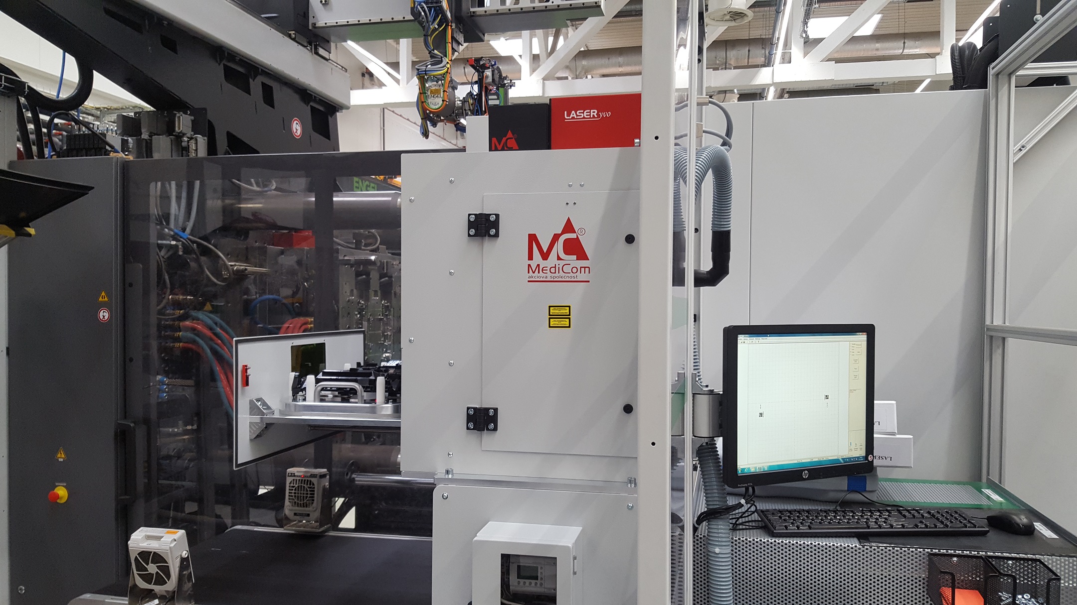 Automatic laser marking of plastic components for the automo - Medicom